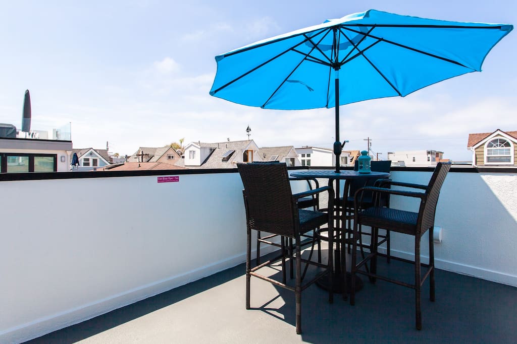 Pink Flamingo | ROOFTOP DECK! | Steps To Water | Home